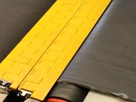 Logistics | Segmented Transfer Plates Close Gap for Midwest Parcel Facility